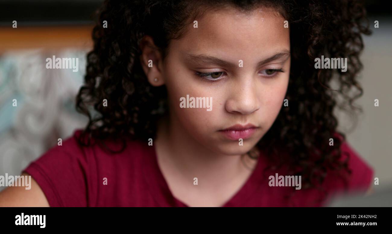 Child using laptop computer at home, little child staring at screen ...