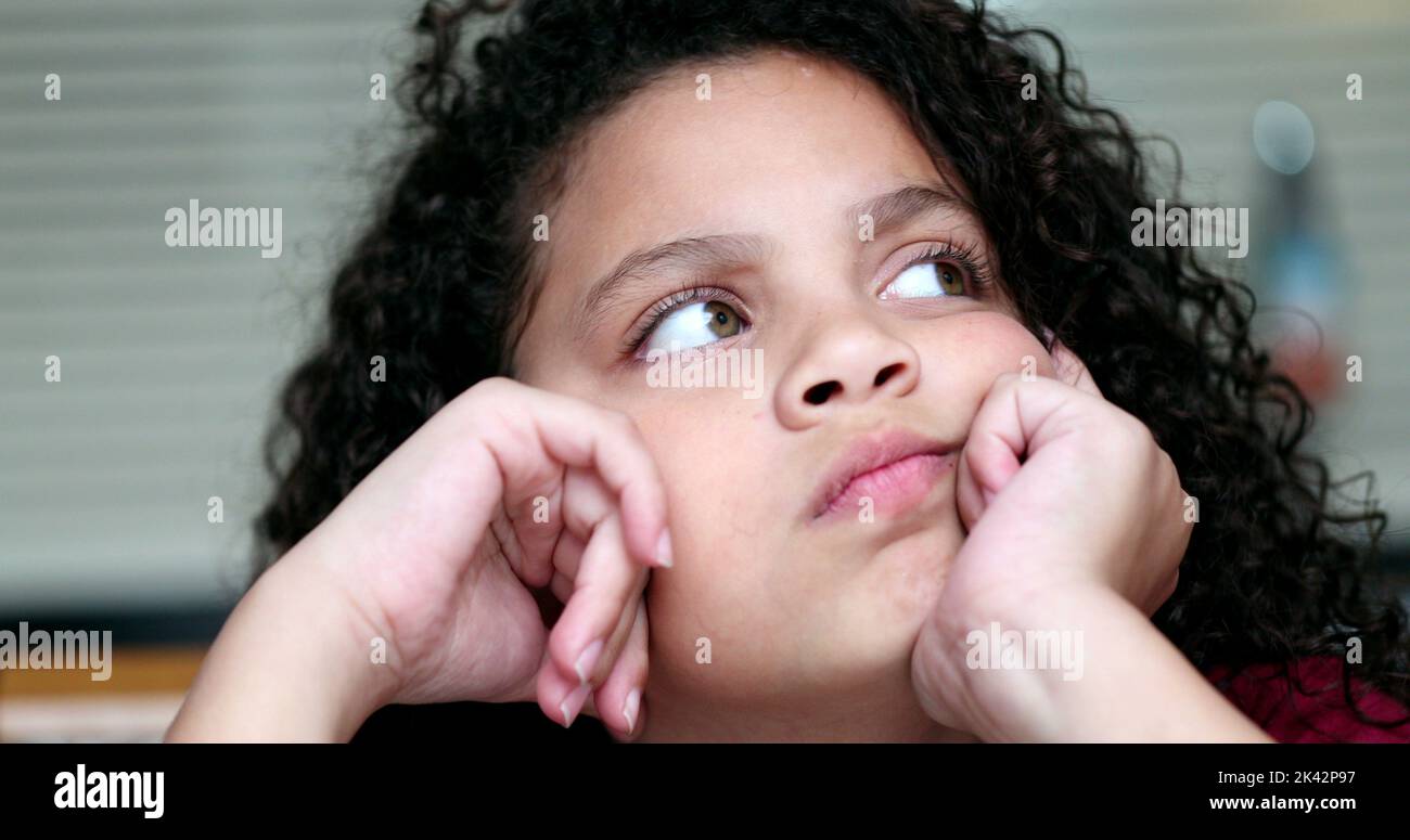Child thinking about solution, pensive kid thoughtful girl Stock Photo ...