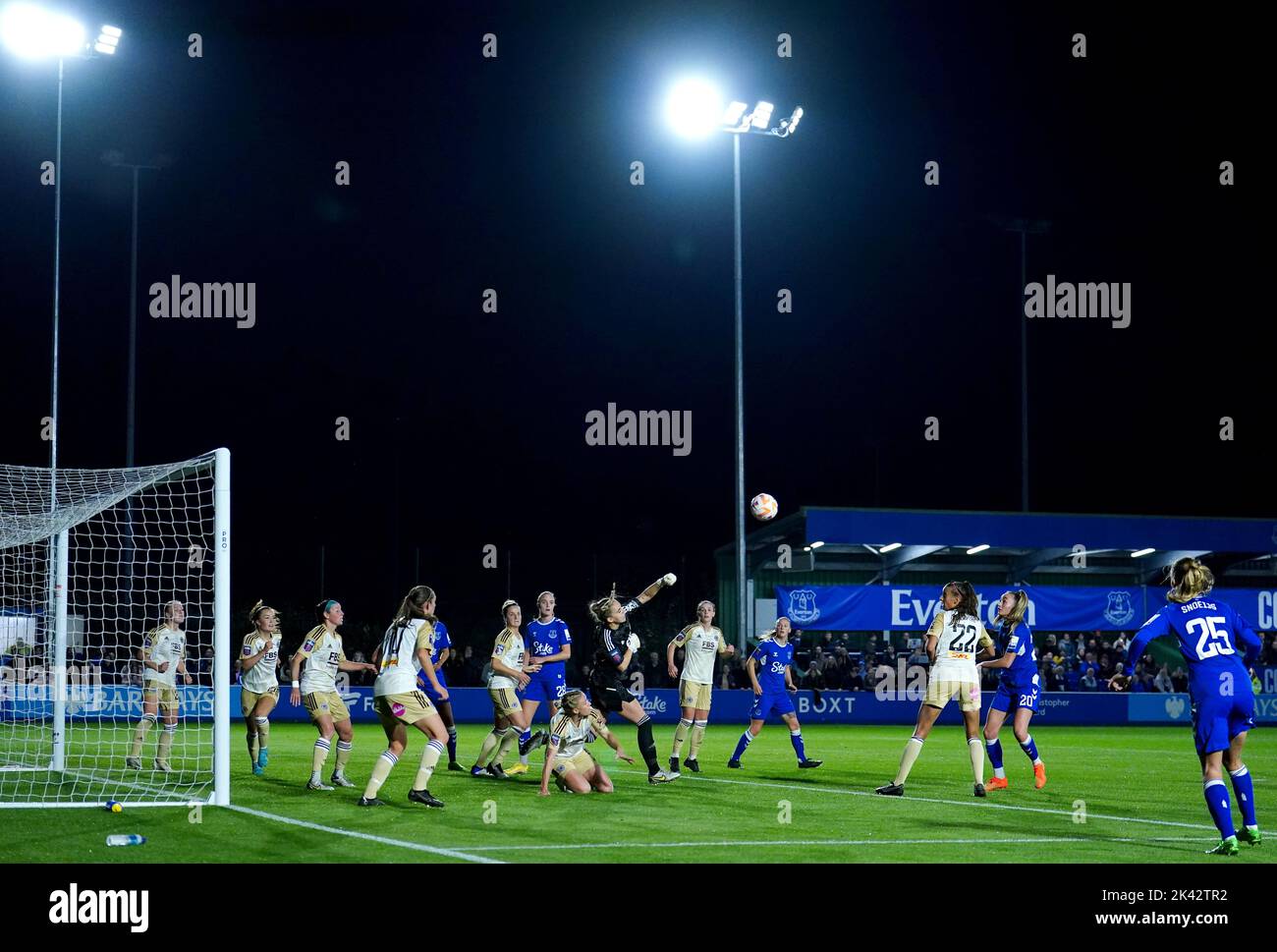 Leicester City goalkeeper Kirstie Levell punches clear from a corner ...