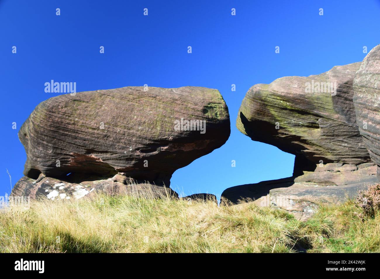 Blue sky and sunlight bathed the Roaches rocks and surrounding ...