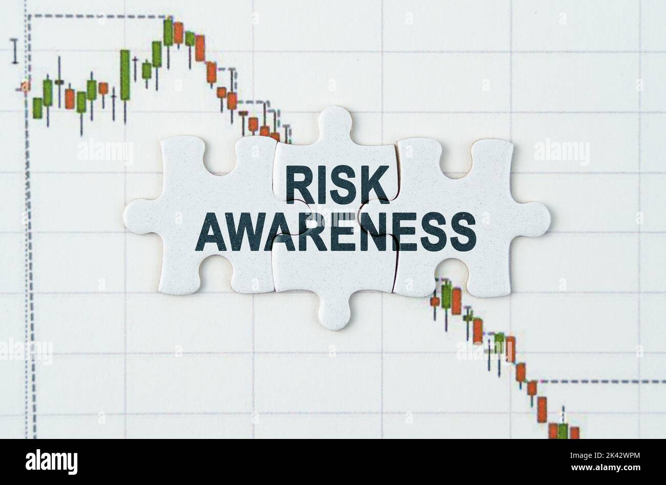 Business concept. On the quotes chart there are puzzles with the ...