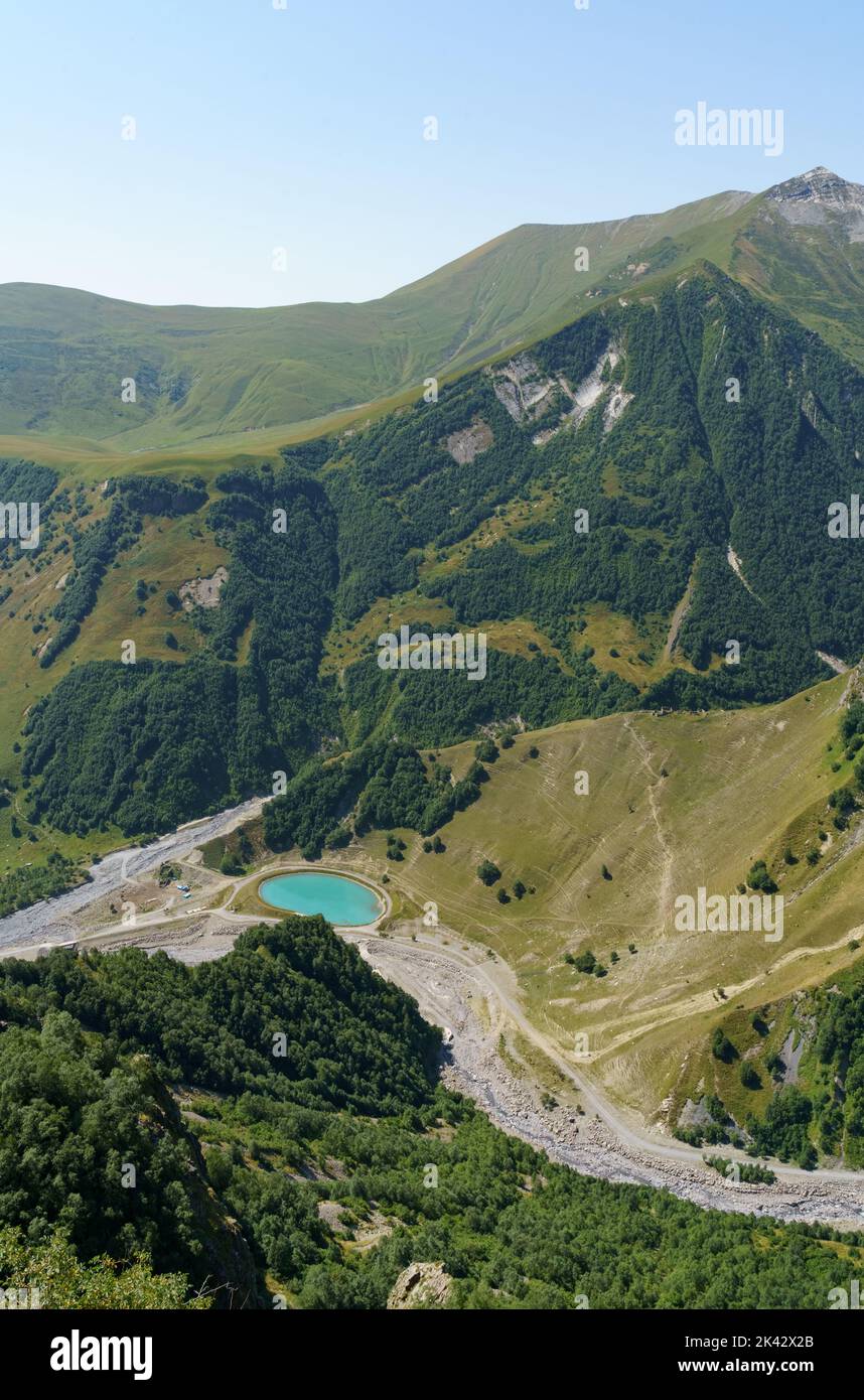 Mountain landscape. View of mountains, forest, gorge and quarry lake in ...