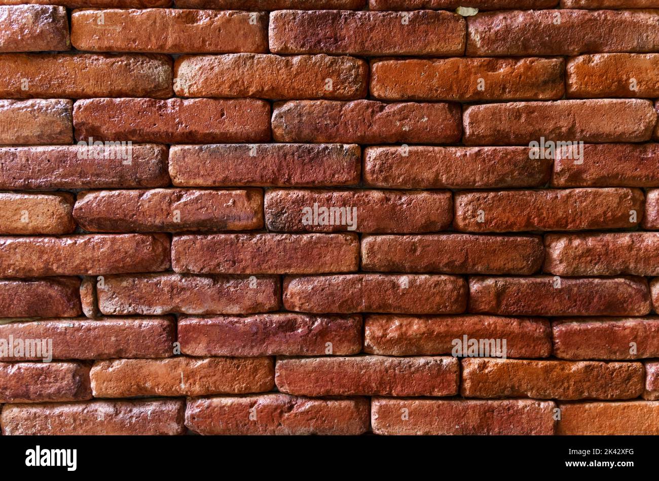 The texture of a wall made of red bricks. Texture and backgrounds Stock ...