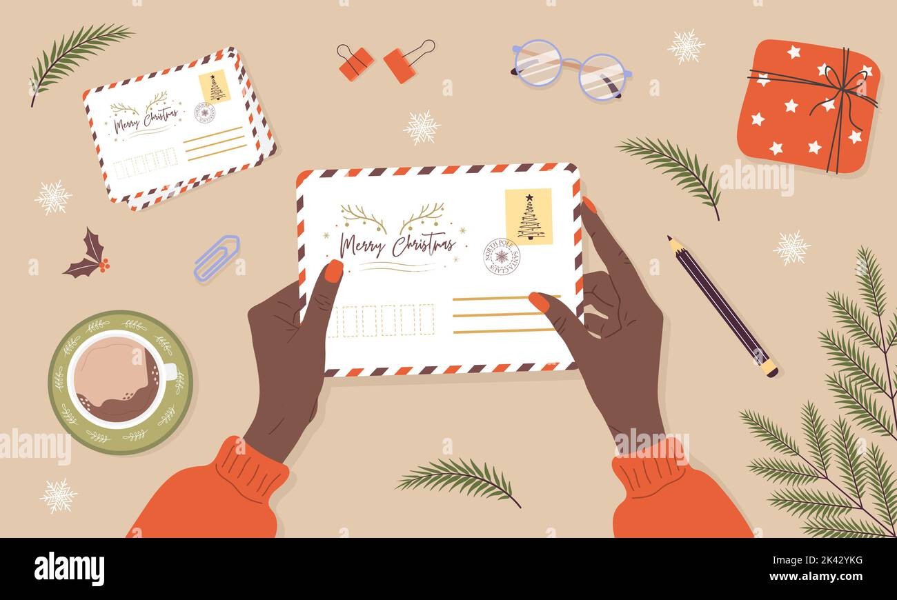 Female hands holding envelope. African woman making handmade greeting ...