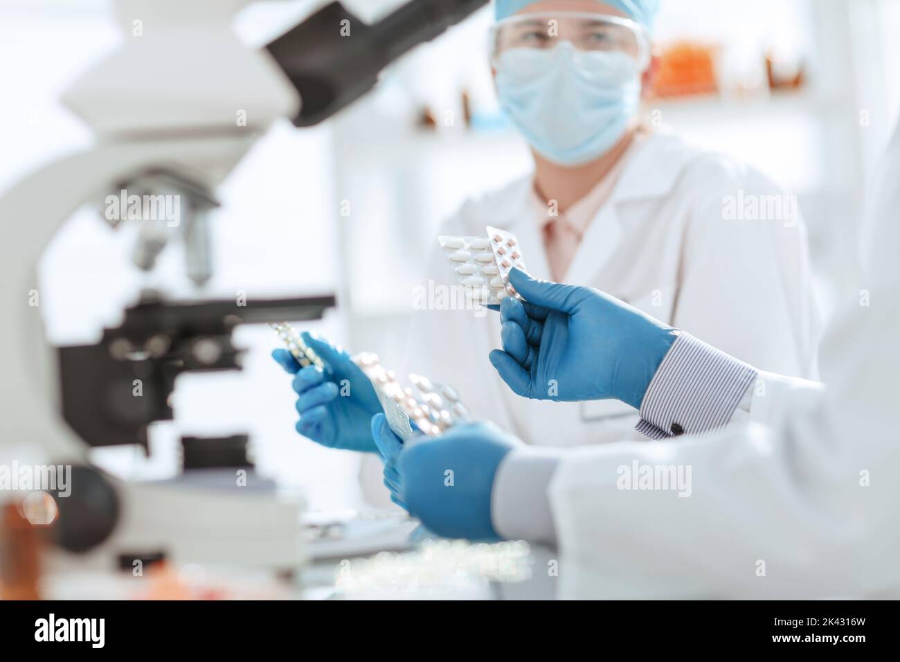 scientists work with samples of new drugs in the laboratory Stock Photo ...