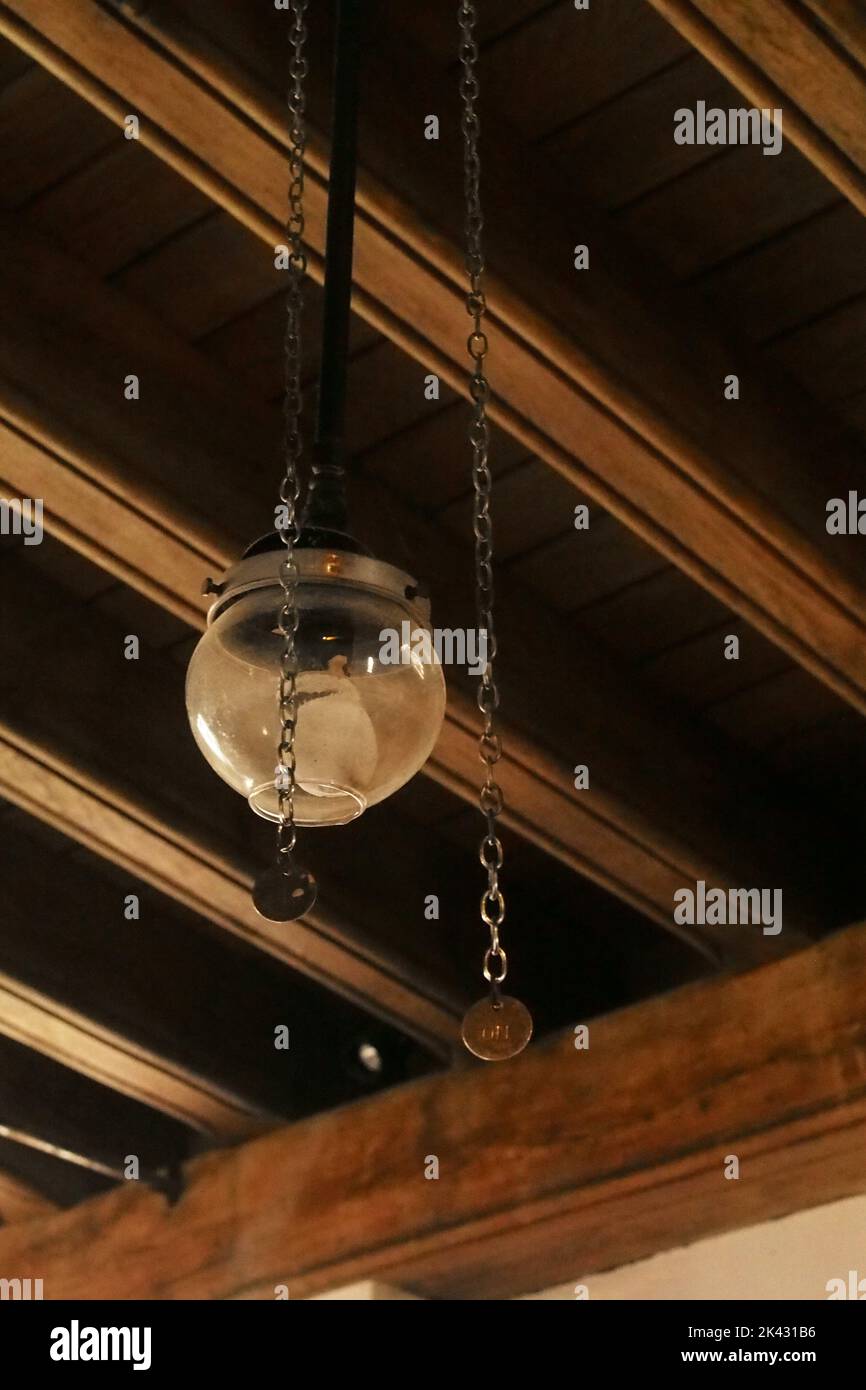An original gas lamp in Brentor church Dartmoor, Devon, England ...