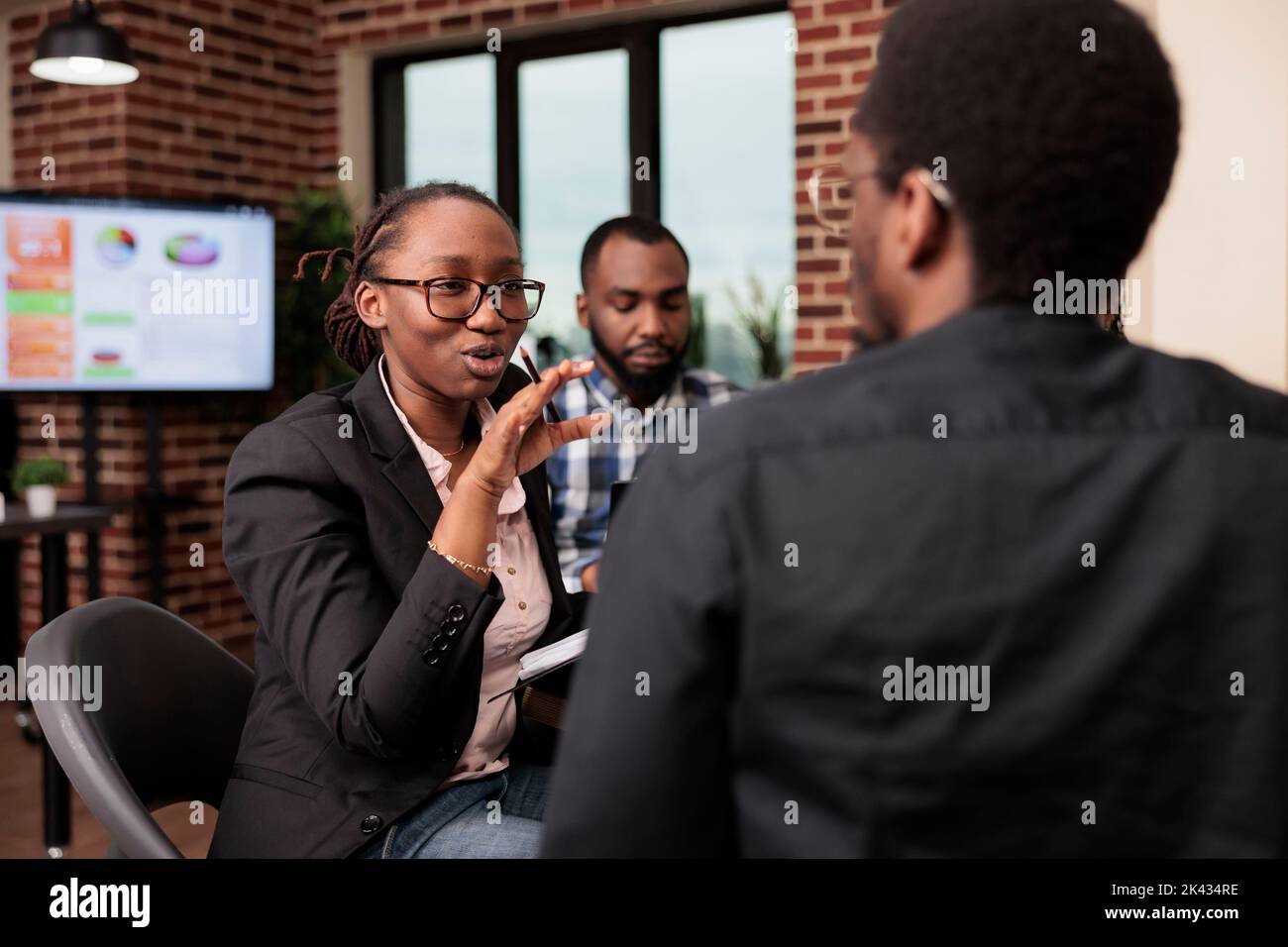 Startup colleagues planning business presentation with data research ...