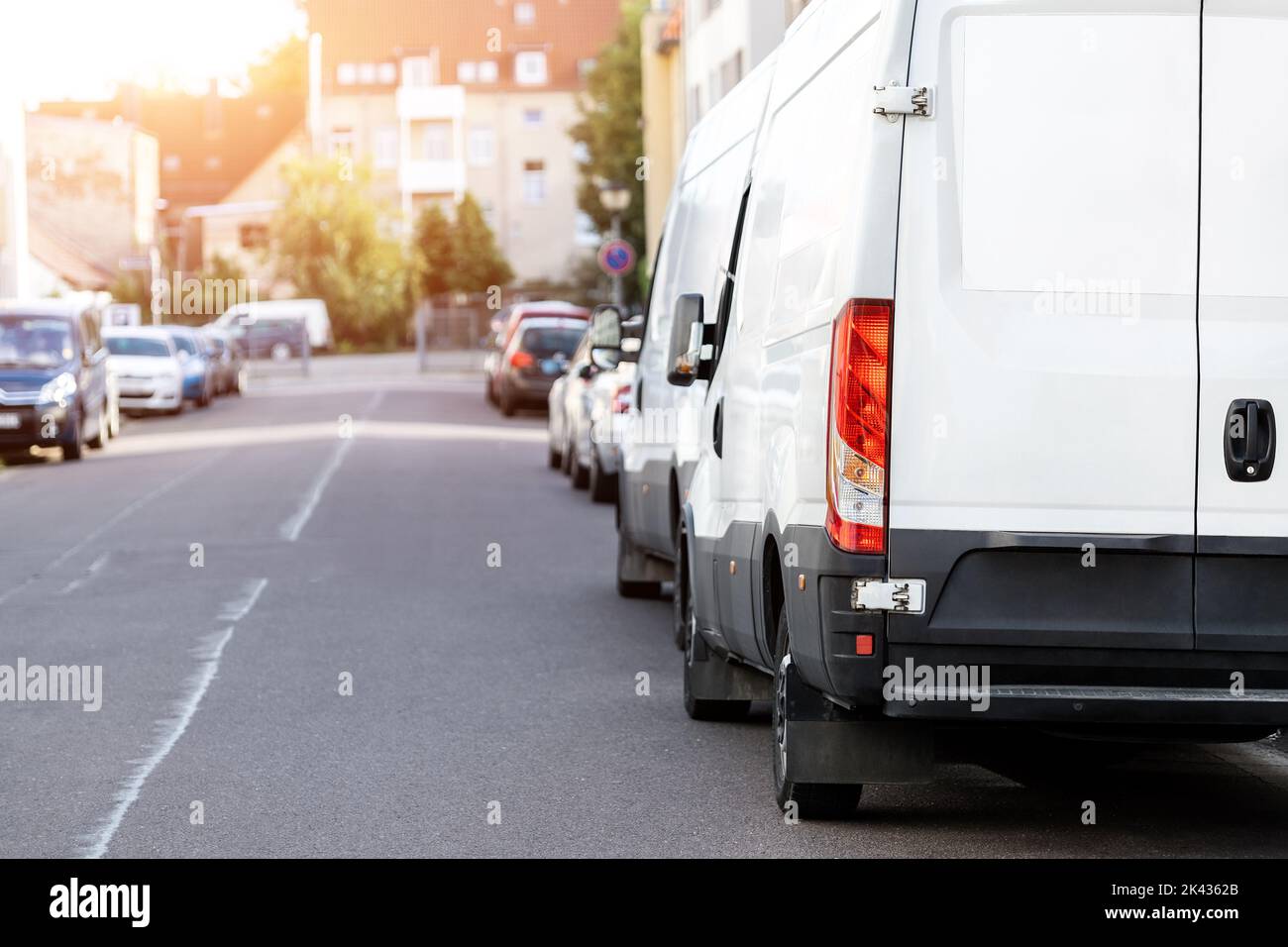 Small cargo delivery van parked in european city central district ...