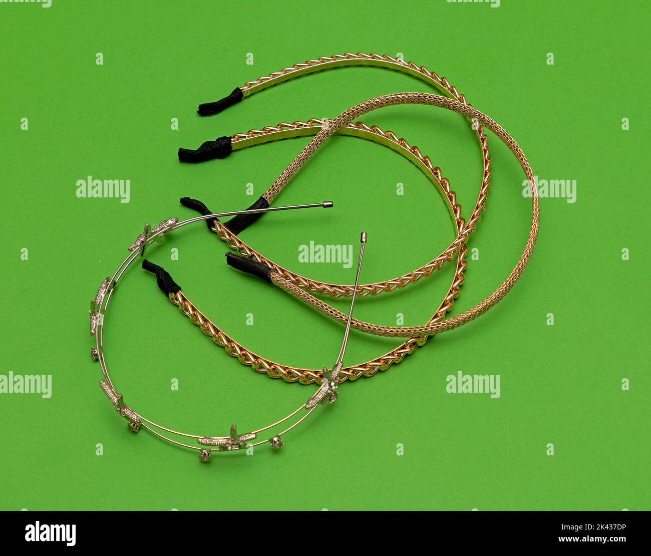 Stack of metal gold and. silver colored fashionable hairstyle beauty ...