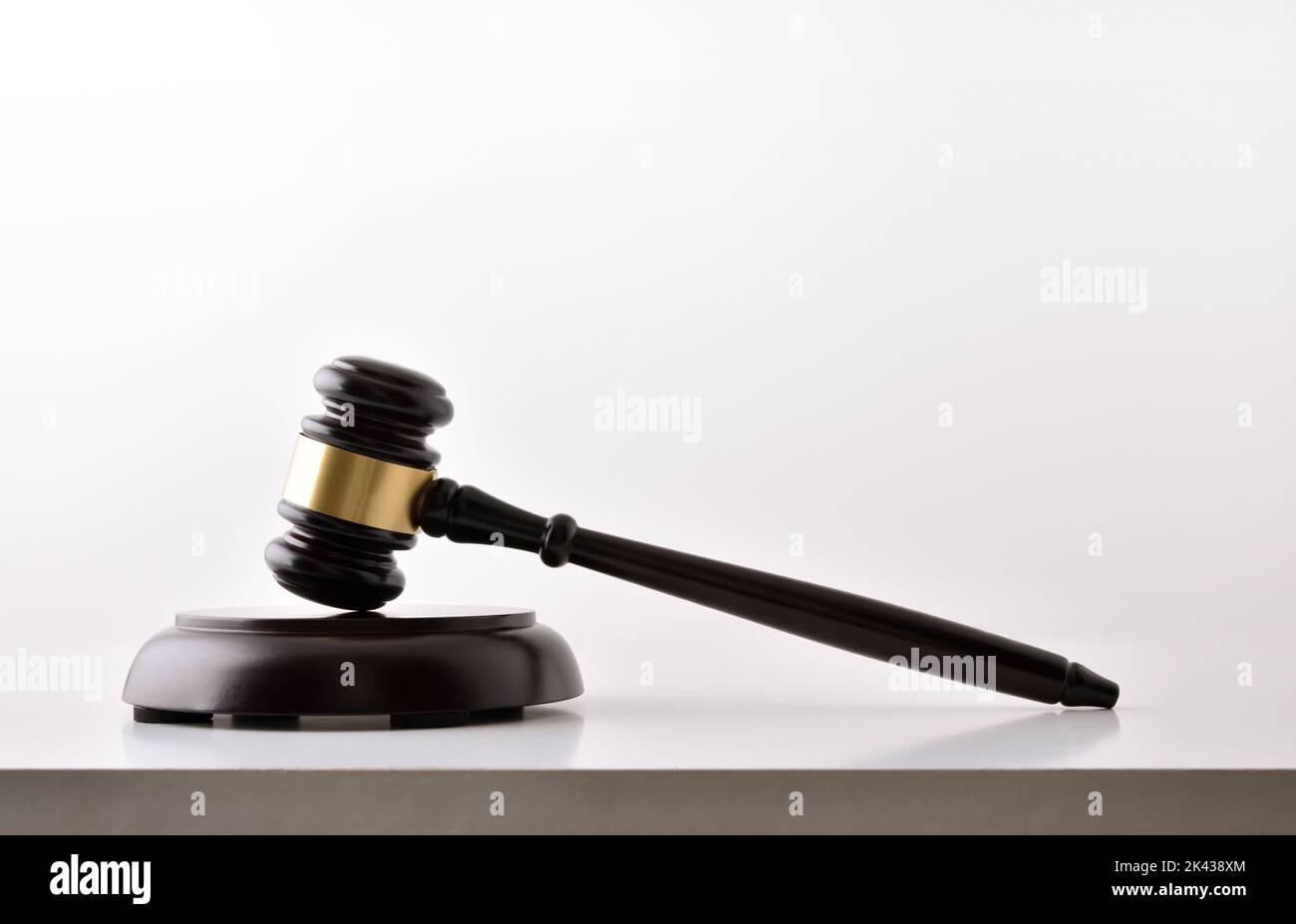 Background of judge's mace on white table and white isolated background ...