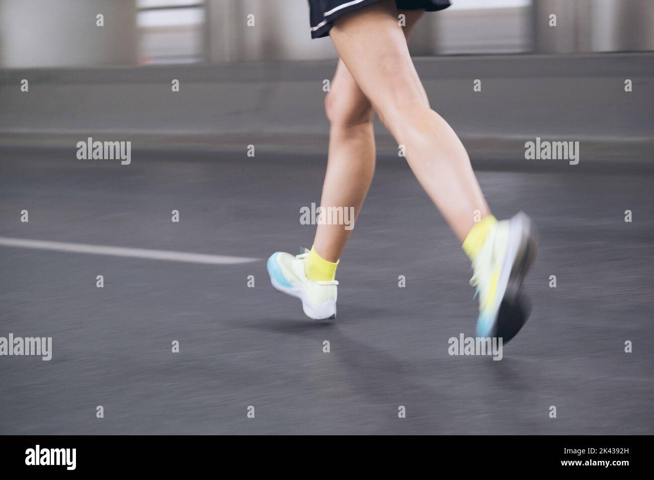 Close up shot feet of the Competitors running in the half marathon are ...