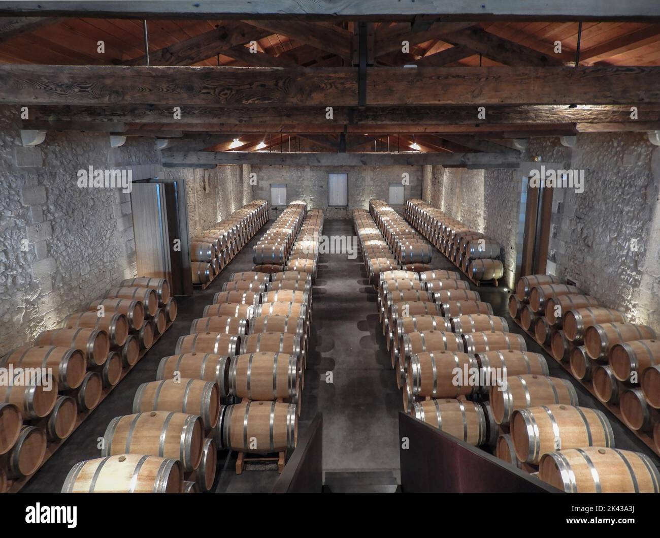 cool old stone cellar containing many new barrels lined up Stock Photo ...