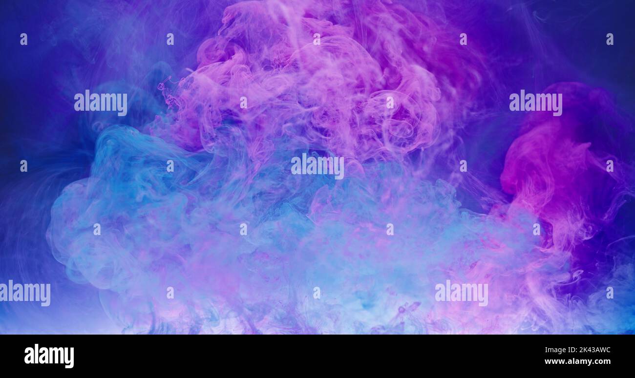 Ink water. Spreading paint clouds. Multicolor dye mixing. Art ...