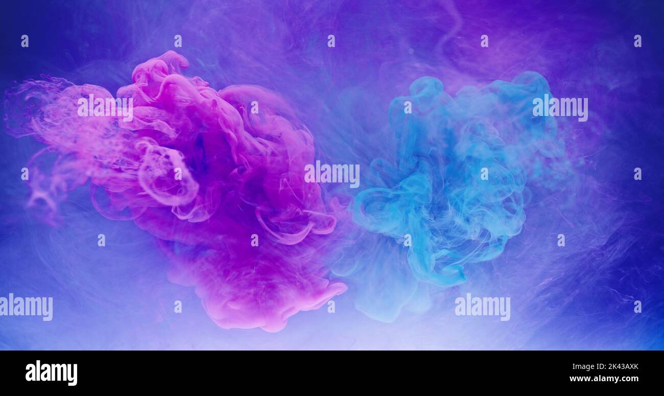 Ink water. Spreading paint clouds. Multicolor dye mixing. Art ...