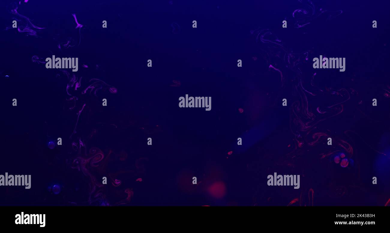 Ink water. Spreading paint clouds. Multicolor dye mixing. Art ...