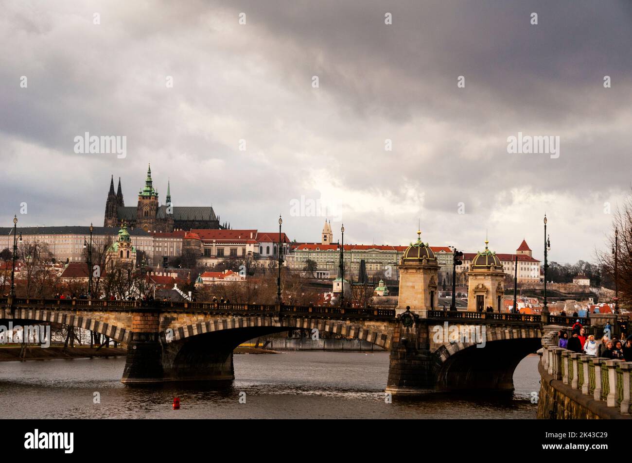 Prague with Gothic towers of St. Vitus Cathedral and Art Nouveau tower ...