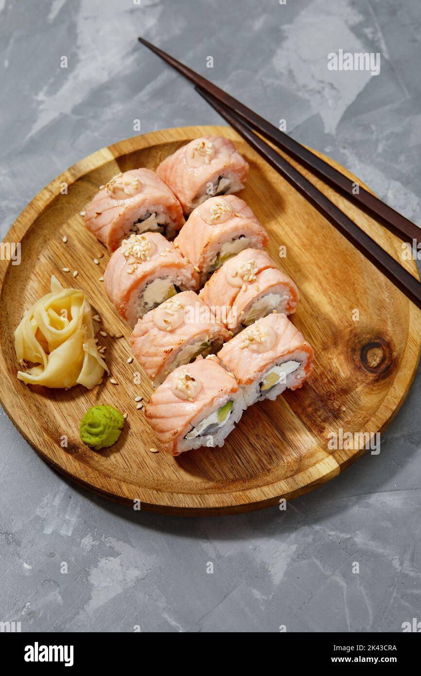 Sushi roll dragon with smoked eel and shrimp. Traditional delicious ...