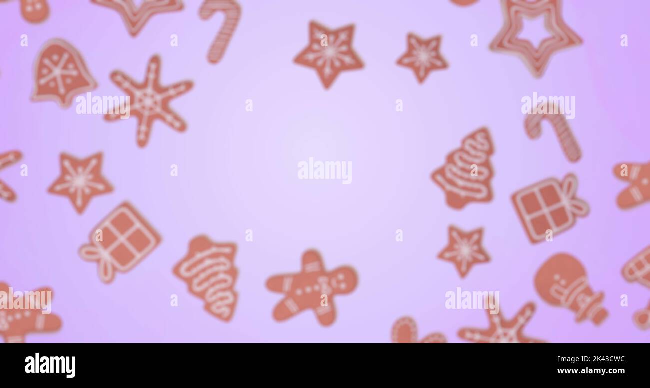 Image of gingerbread falling at christmas over blue background ...