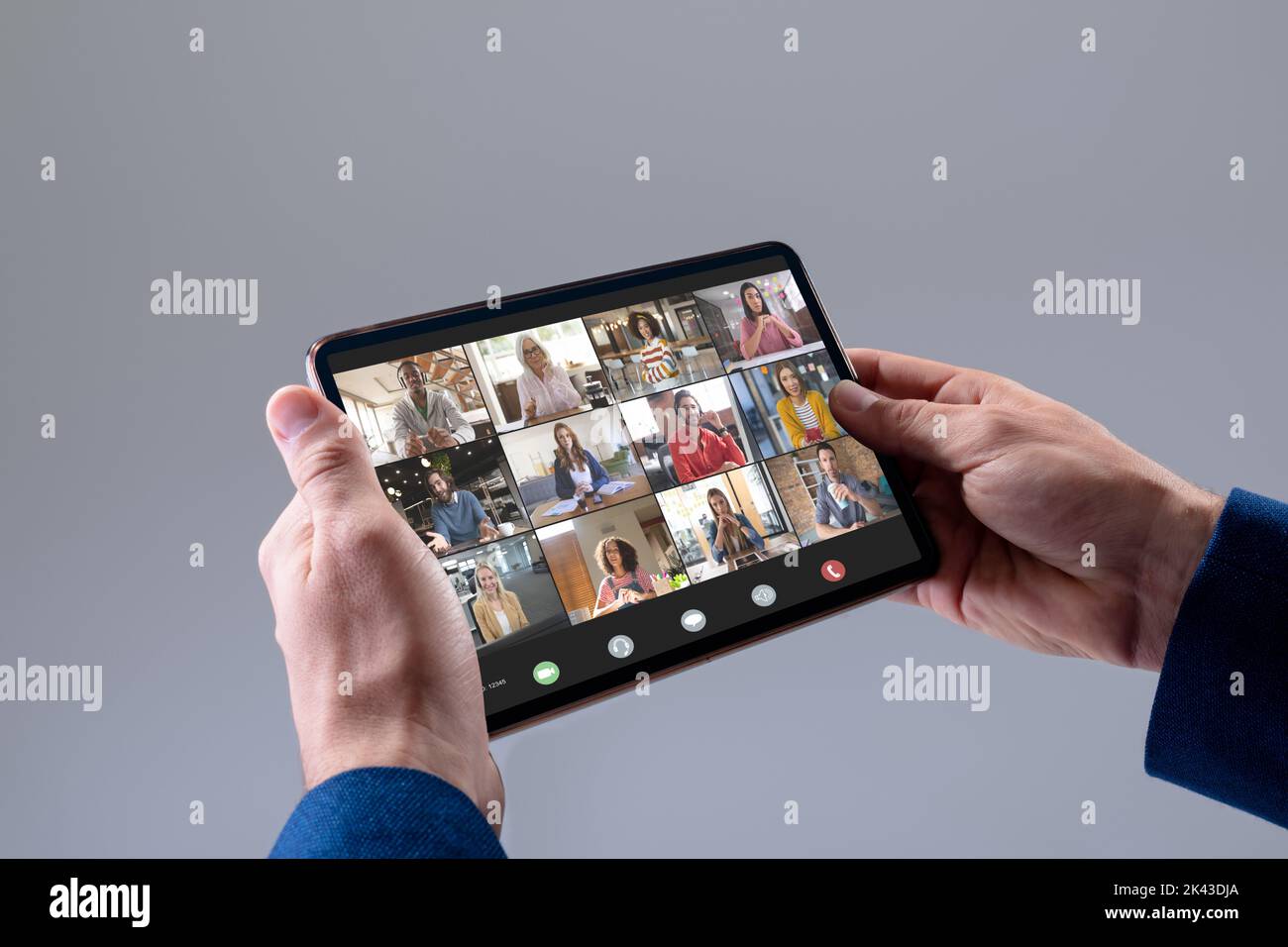 Hands of caucasian businessman making video call on tablet with diverse ...