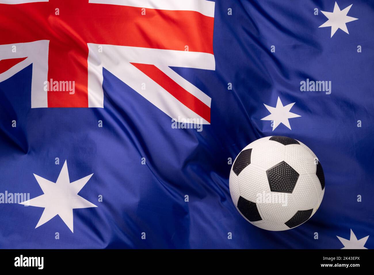 Composition of football over national flag of australia Stock Photo - Alamy