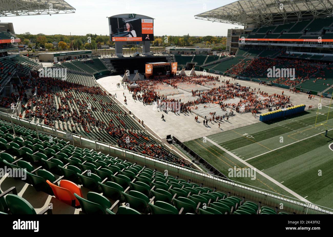 An orange seat, lower left, was revealed at Miyo-wiciwitowin Day, held at Mosaic Stadium in ...