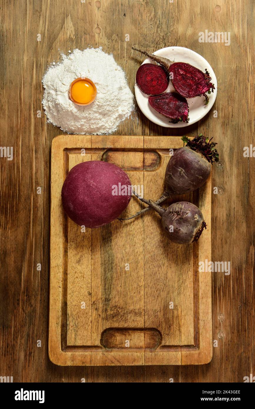 Ingredients ready on the table to make pasta of different flavors Stock ...