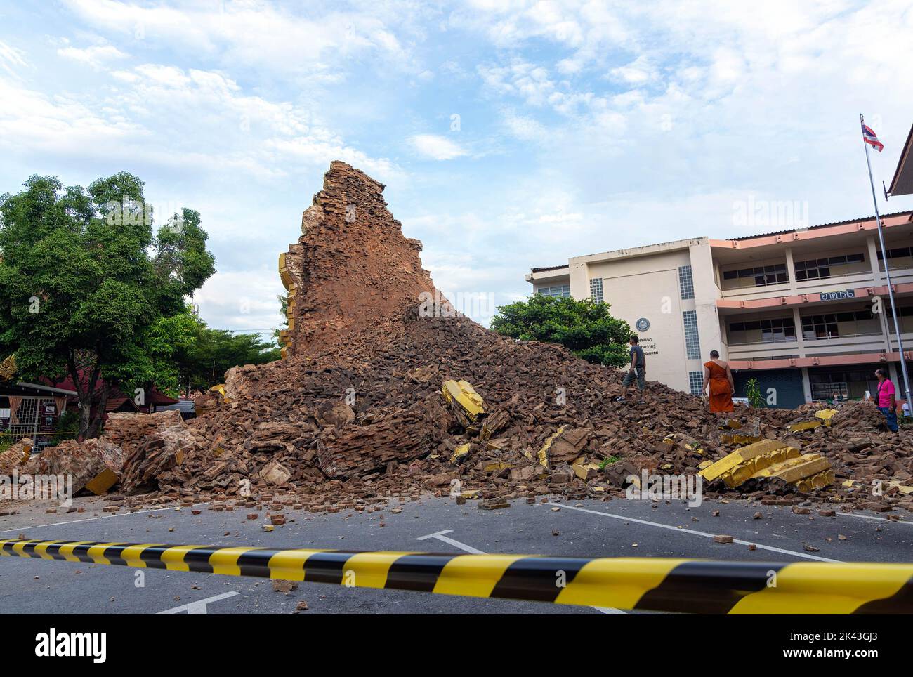 A monk inspects the Ancient Buddhist pagoda a 500-year-old Buddhist ...