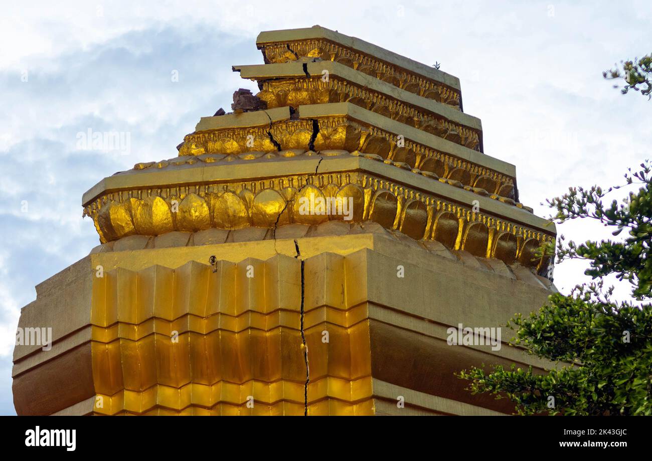 A view of a crack formed down the side of the Ancient Buddhist pagoda a ...