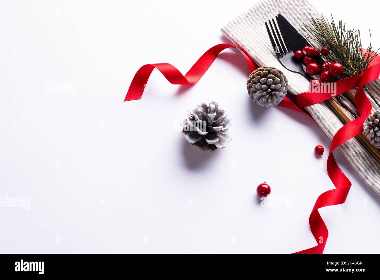 Image of christmas place setting with cutlery and copy space on white ...