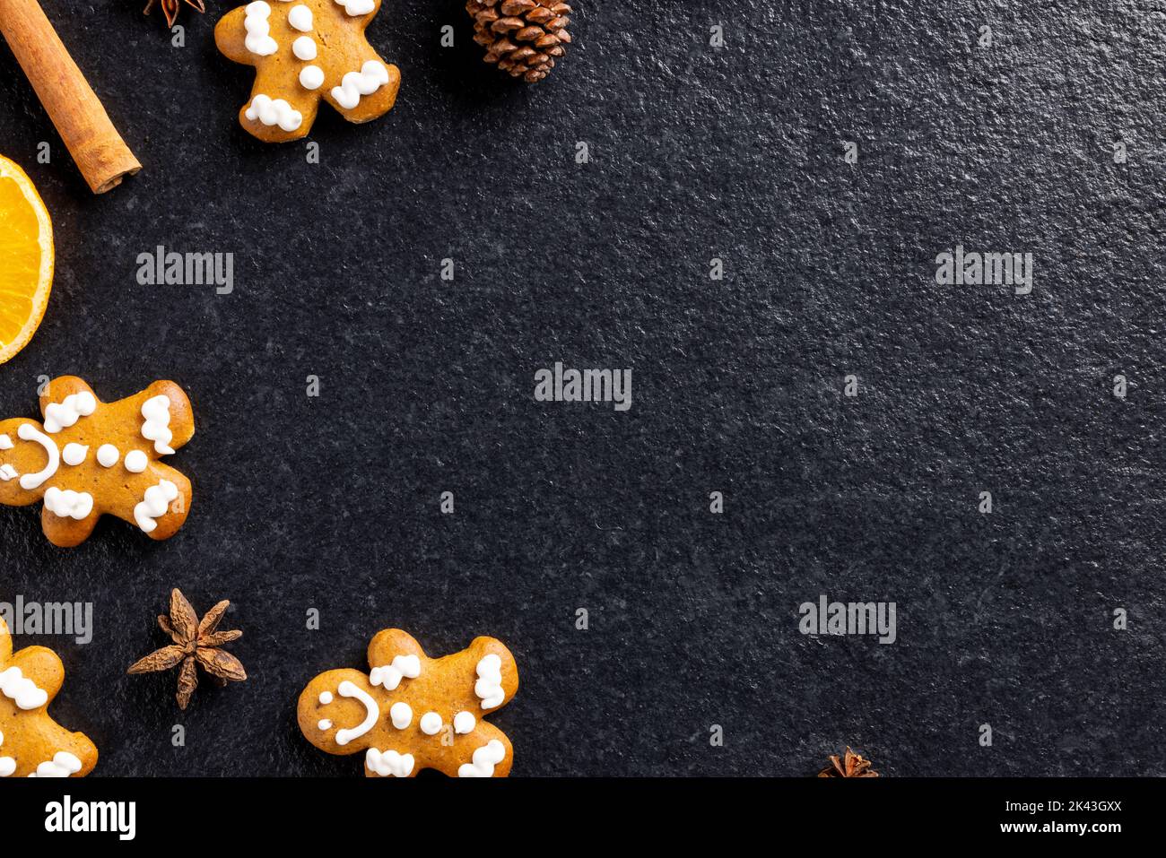 Image of gingerbread man cinnamon sticks and christmas decoration with ...