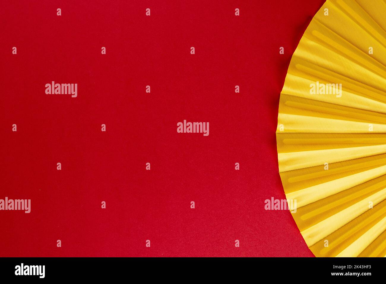 Composition of traditional chinese fan on red background Stock Photo ...