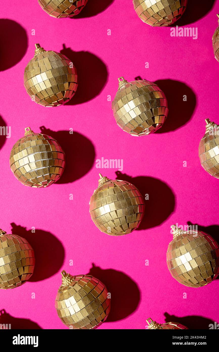 Composition of close up of new years baubles on pink background Stock ...