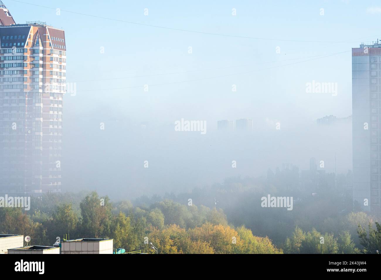 September 27, 2022. Russia, Moscow. A view of a foggy street. Thick fog ...