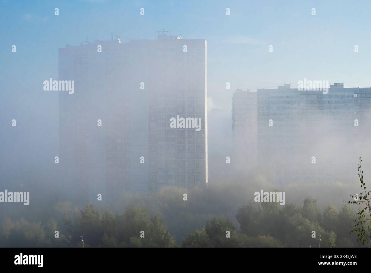 September 27, 2022. Russia, Moscow. A view of a foggy street. Thick fog ...
