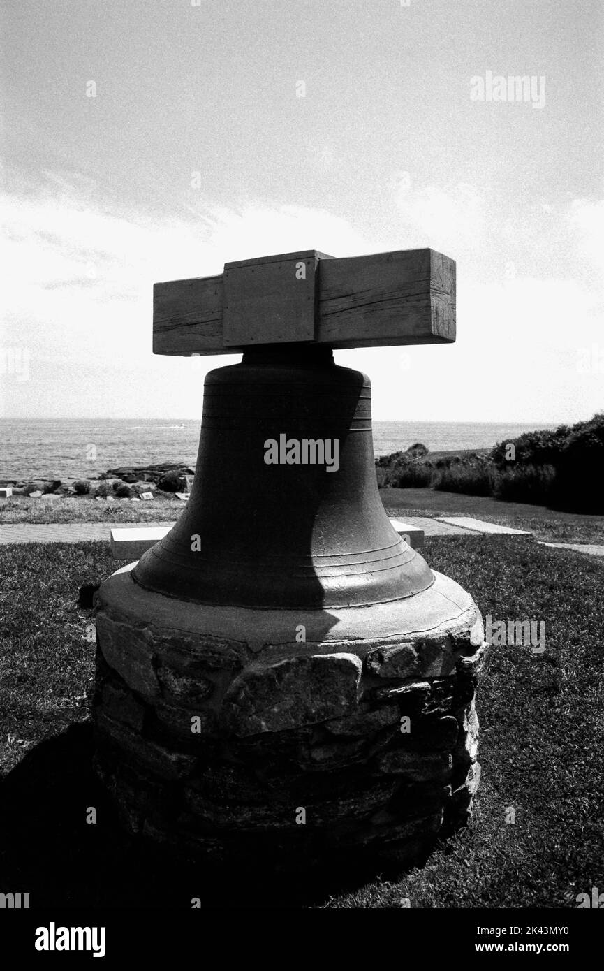 A fog bell convered to a monument rests on the lawn at the Nubble ...