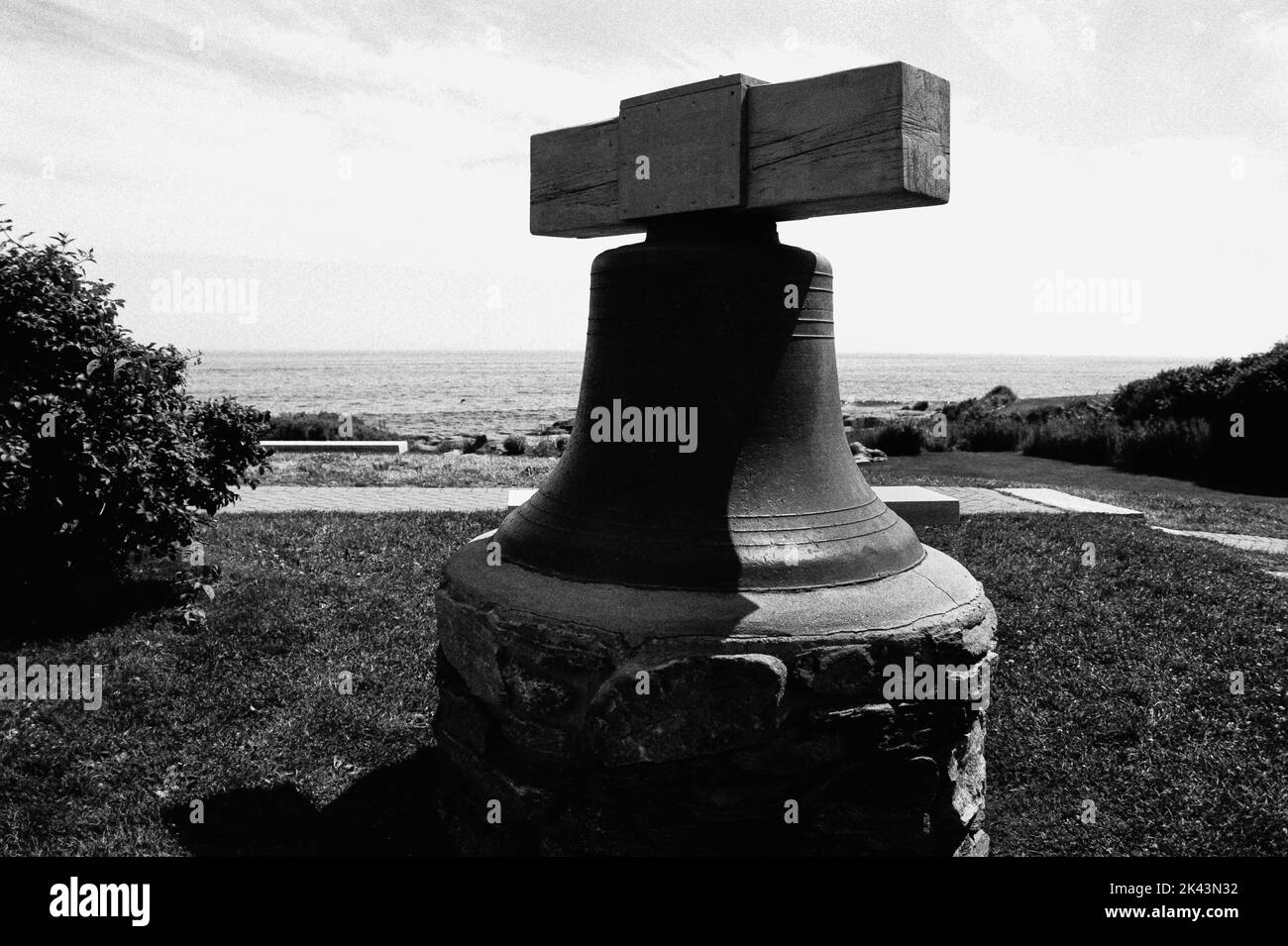 A fog bell convered to a monument rests on the lawn at the Nubble ...