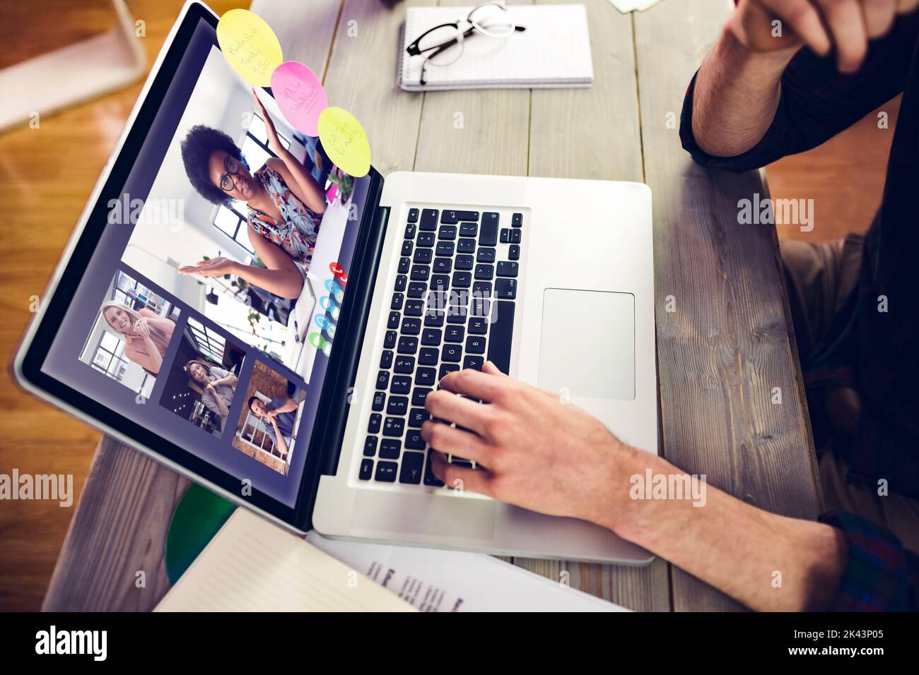 Music app against midsection of creative editor working on laptop Stock ...