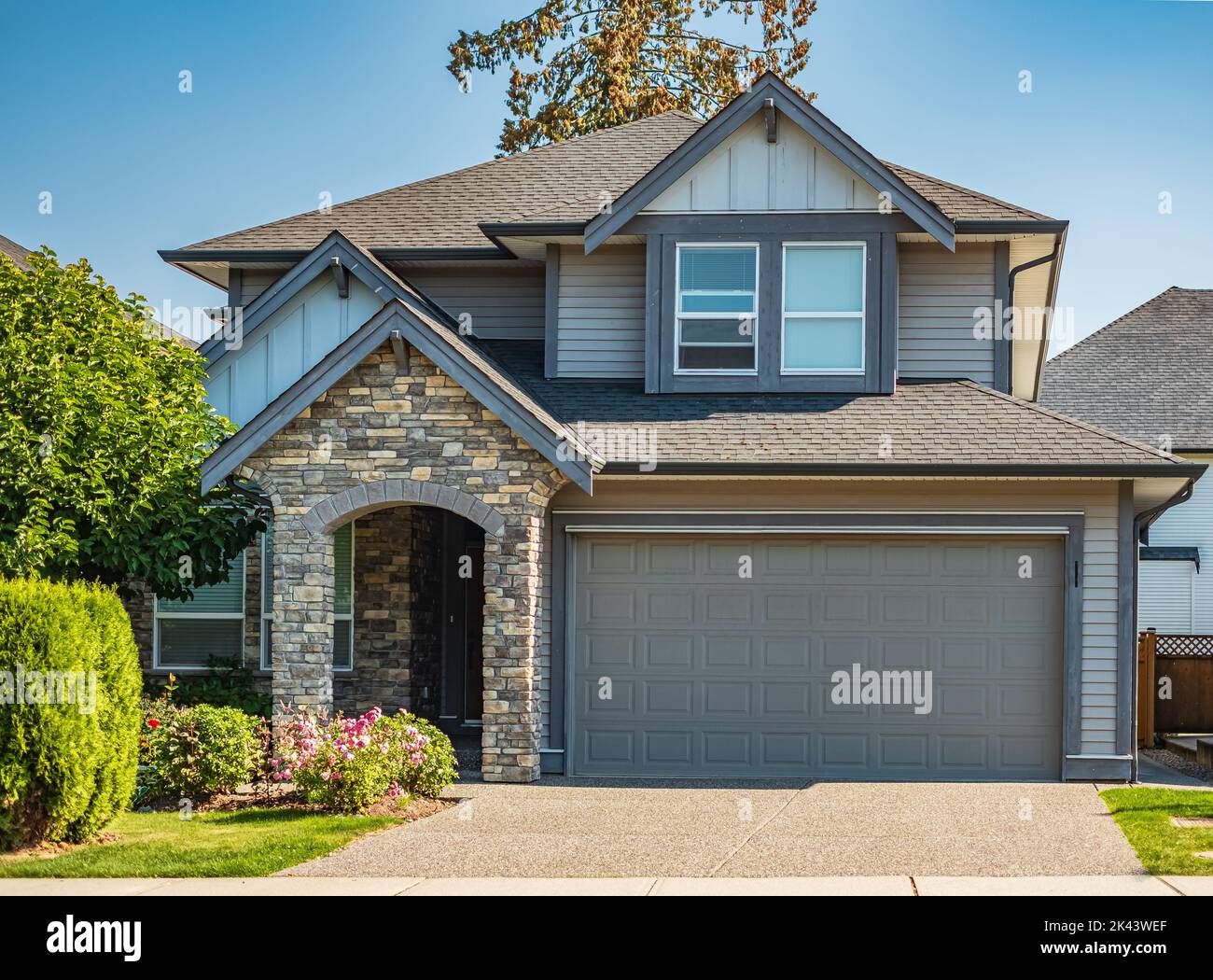 Big custom made luxury house with nicely landscaped front yard and long ...