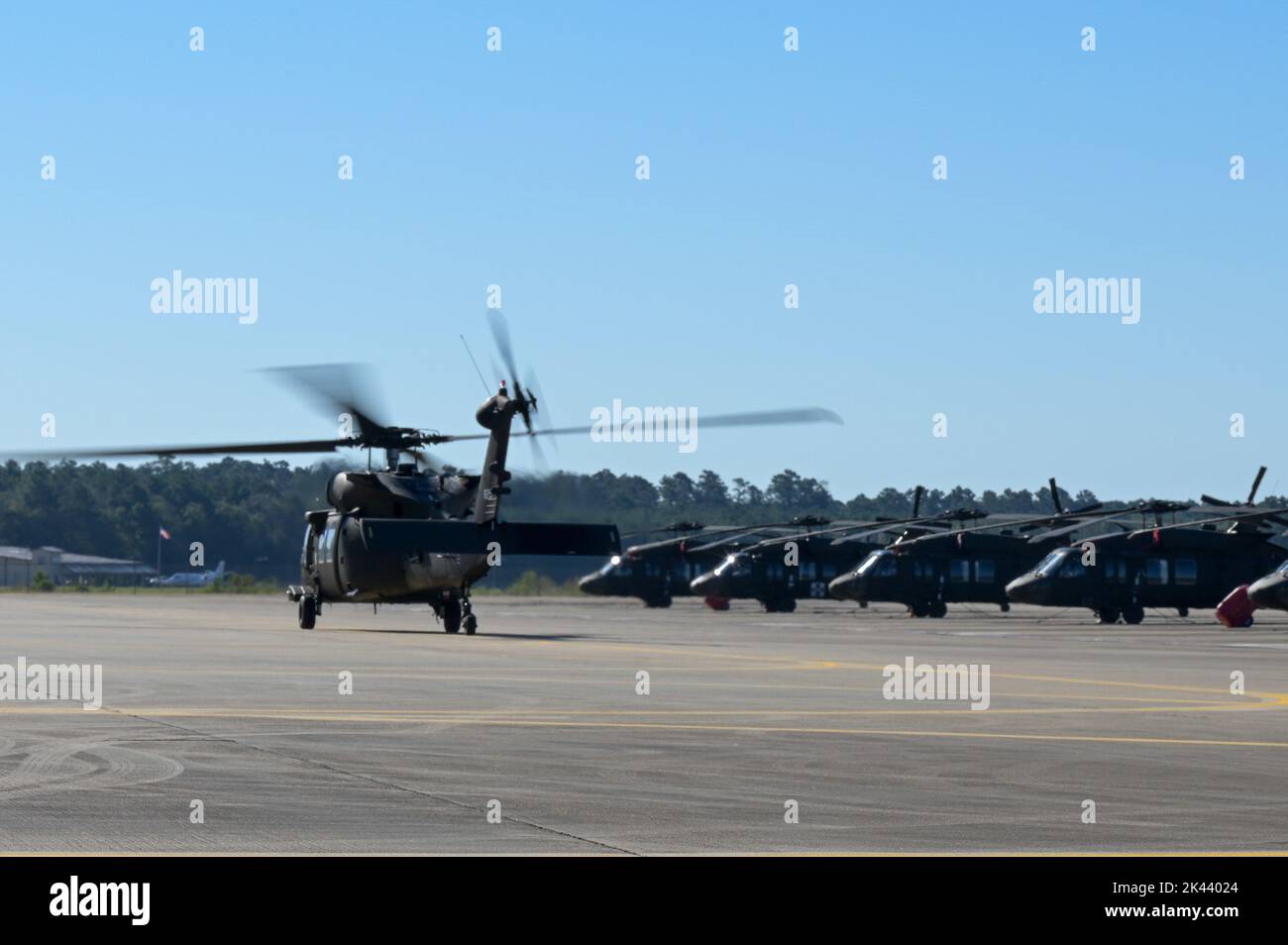 A UH-60 Black Hawk helicopter departs a Louisiana Army National Guard ...