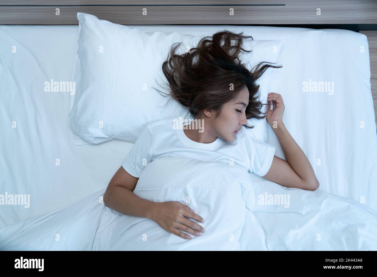 Top View of Beautiful Young Woman Sleeping Cozily on a Bed in His ...