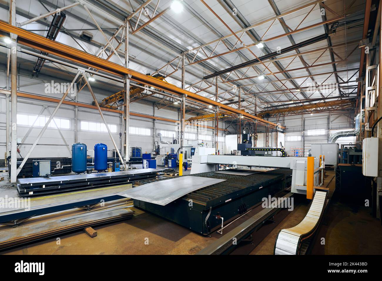 Metal sheets processing workshop with modern equipment Stock Photo - Alamy