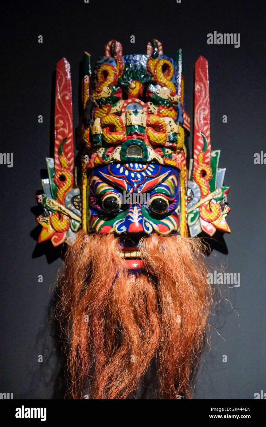 Antique Chinese mask Stock Photo - Alamy