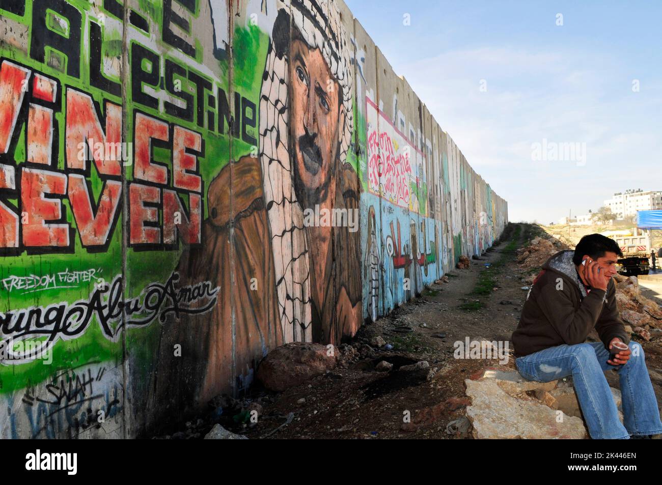 Yasser Arafat mural on the Israeli wall barrier near the Kalandia ...