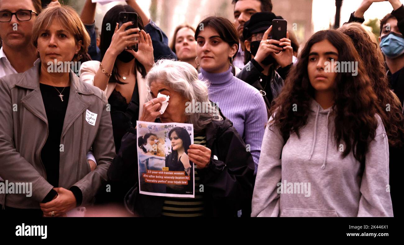 New York City, USA. 29th Sep, 2022. People hold a vigil for Masha Amini ...