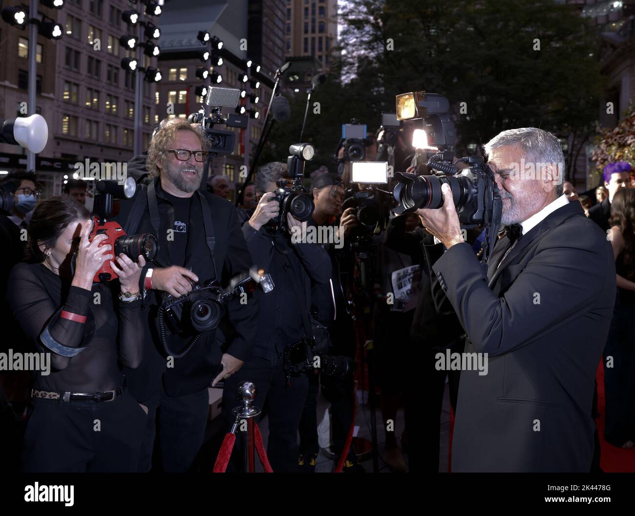New York, United States. 29th Sep, 2022. George Clooney uses a red ...