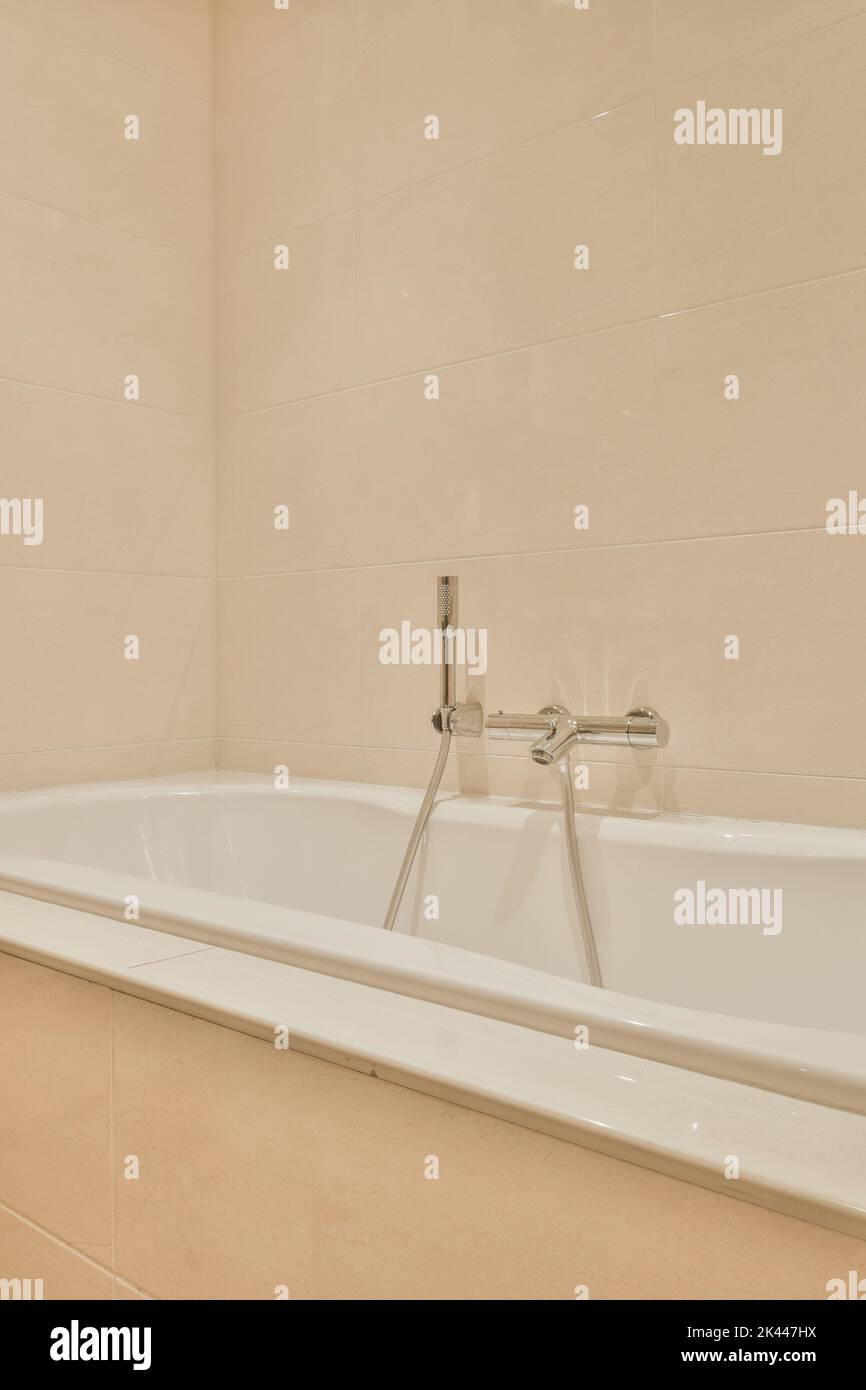 Modern home interior design of white bathroom with open bathtub and ...