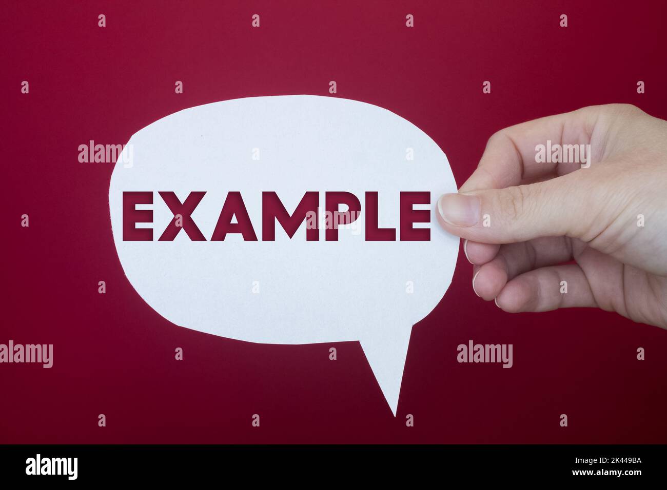 Speech bubble in front of colored background with Example text Stock ...