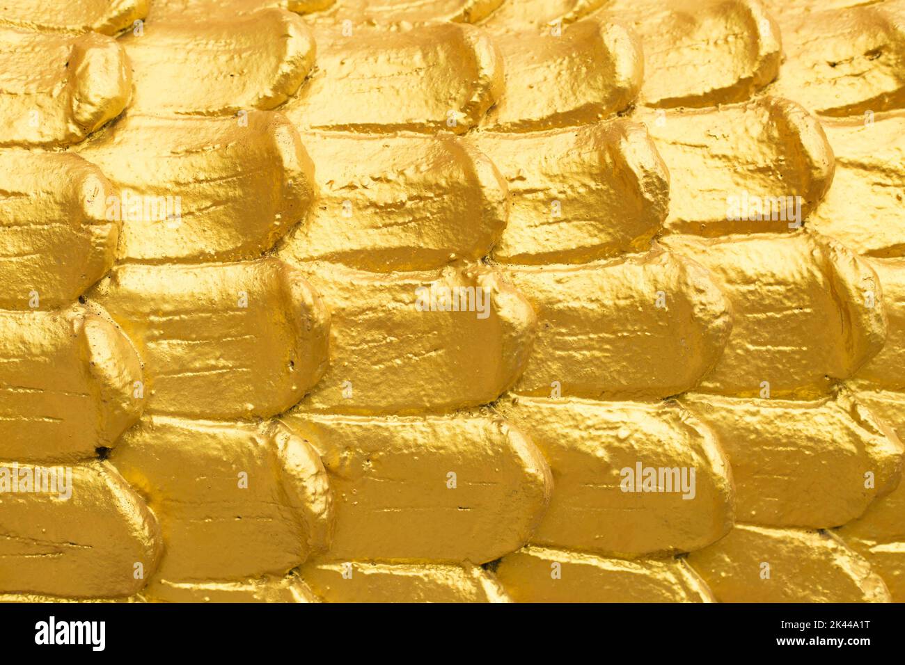 Abstract golden scales close up texture Stock Photo - Alamy