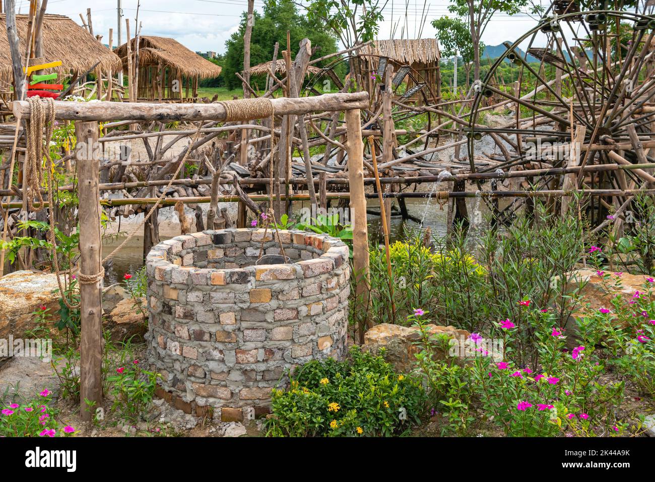 Beautiful artesian well made by bricks with cement and wheel pulley ...