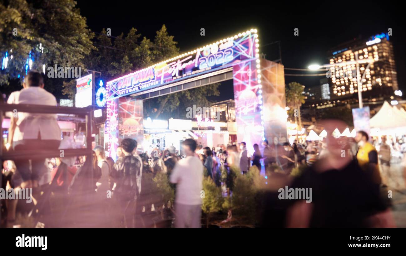 People Attending Let's Glow Together Night Parade event on Beach Road ...